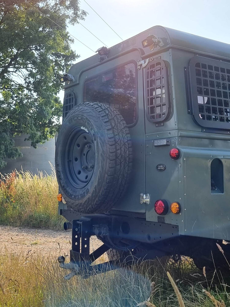 Defender rear quarter window guards – Far Corners